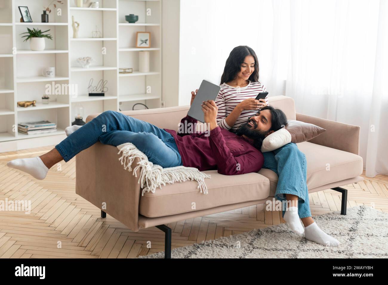 Technology gadgets addicted family hi-res stock photography and images ...