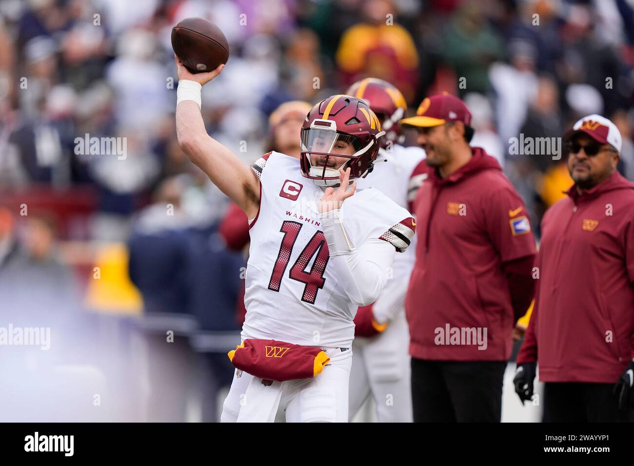 Washington Commanders quarterback Sam Howell (14) throwing the ball during pregame warmups ...