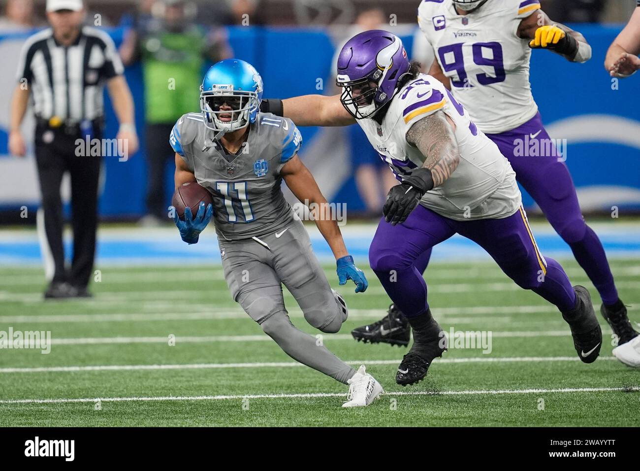 Detroit Lions wide receiver Kalif Raymond is chased by Minnesota ...