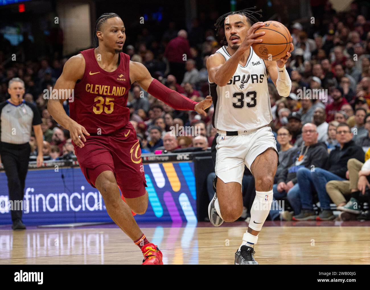 Cleveland Cavaliers' Isaac Okoro (35) defends against San Antonio Spurs ...