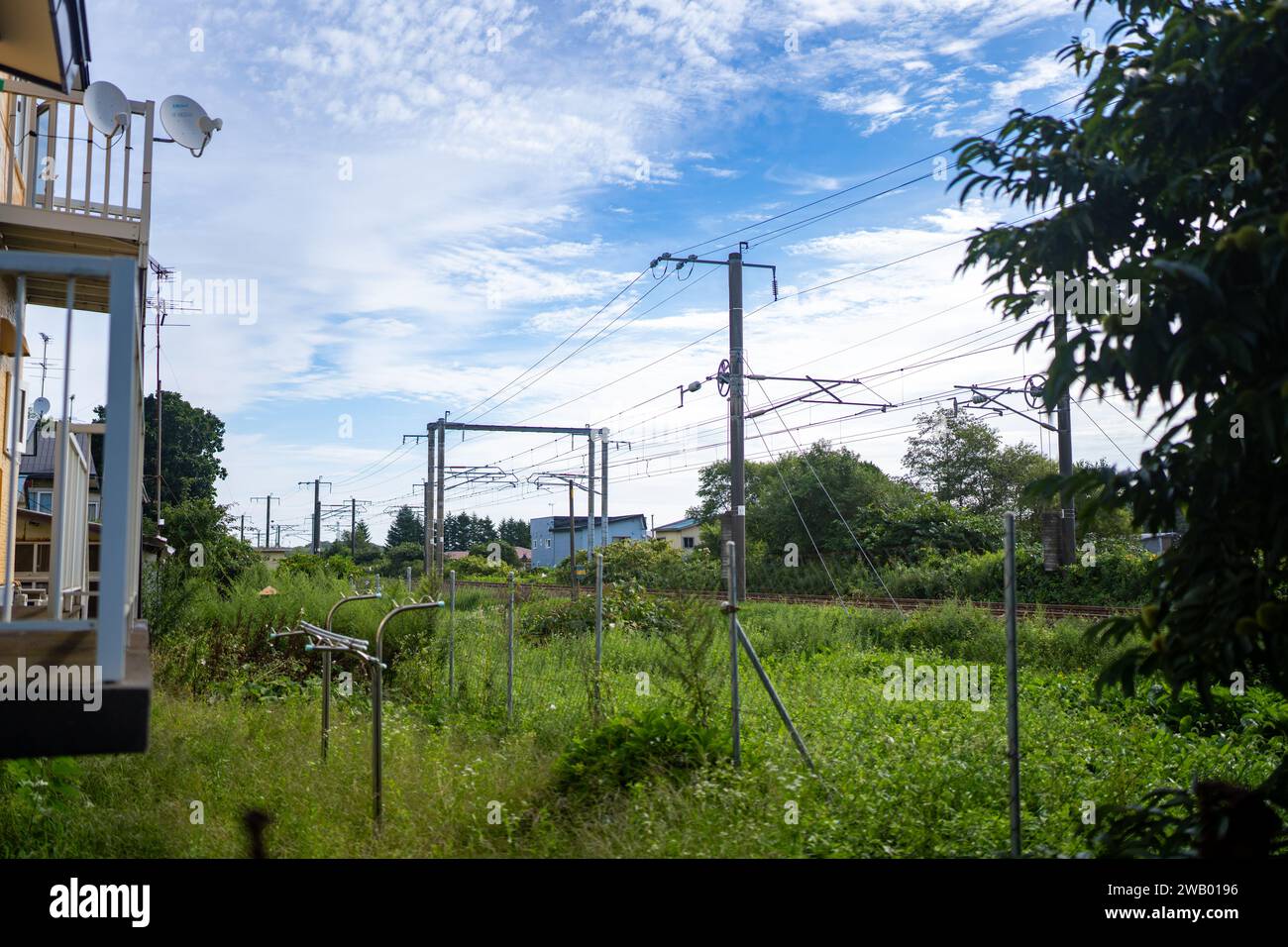grassy rural rail line in hokkaido japan Stock Photo - Alamy