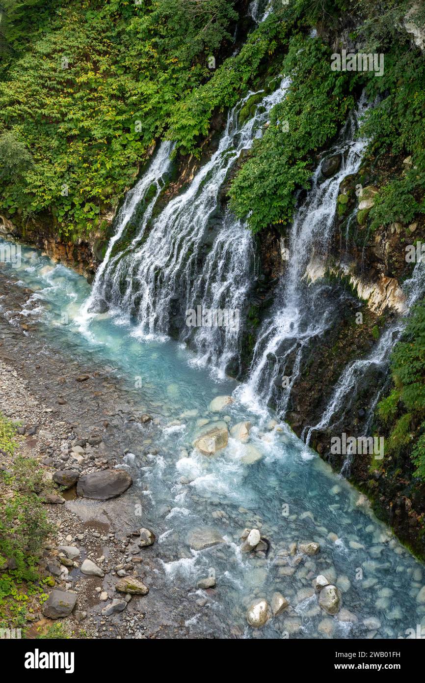the blue waters of the shirahige waterfall in cental hokkaido near biei ...