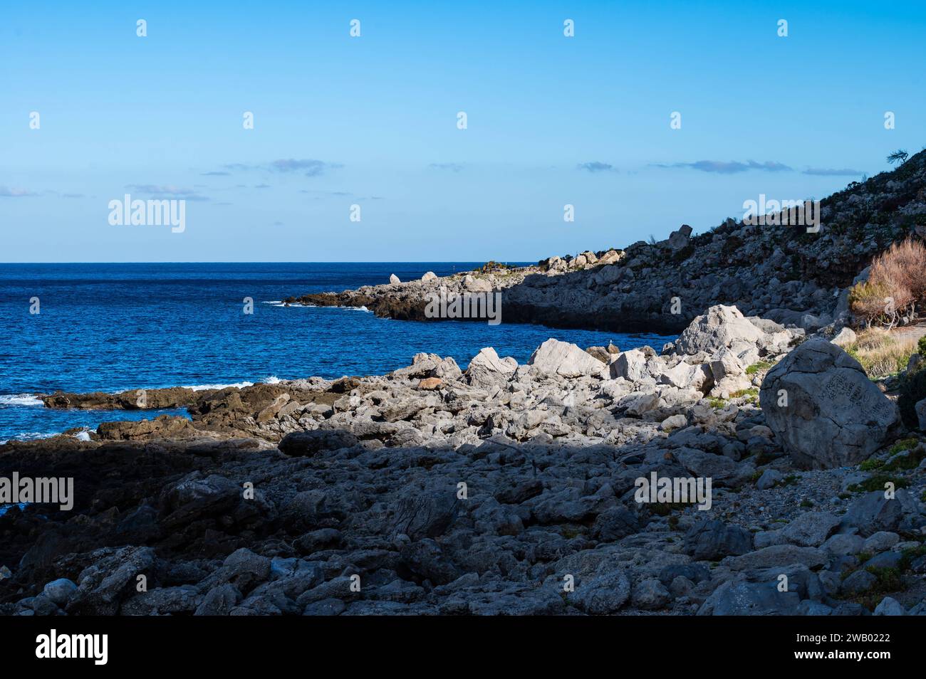 Panorama of blue water and rough rocks at Capo Gallo, Sicily, Italy ...