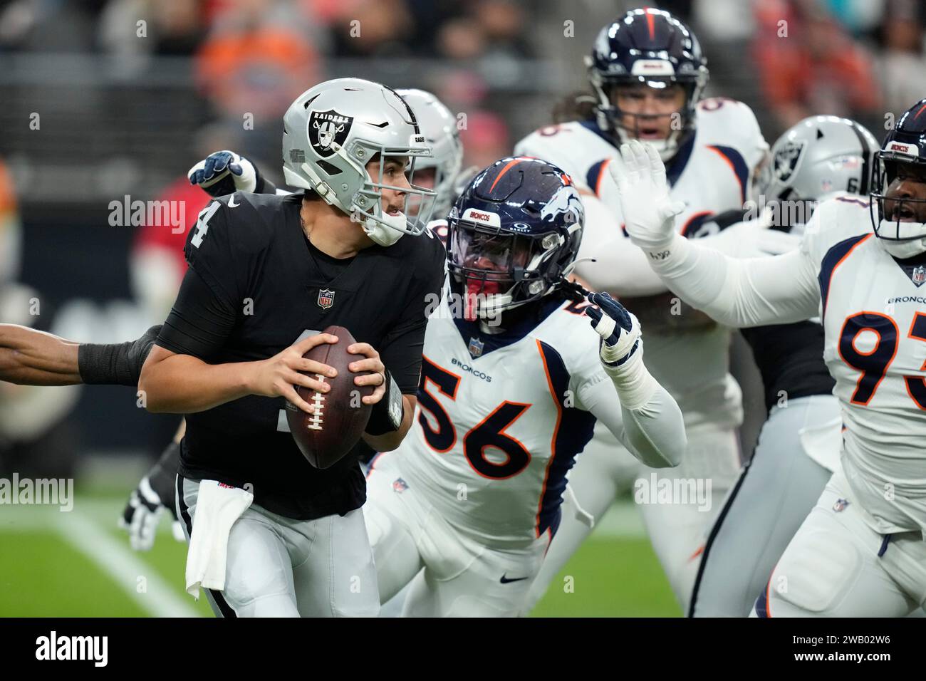 Denver Broncos linebacker Baron Browning (56) moves in for the sack against Las Vegas Raiders ...