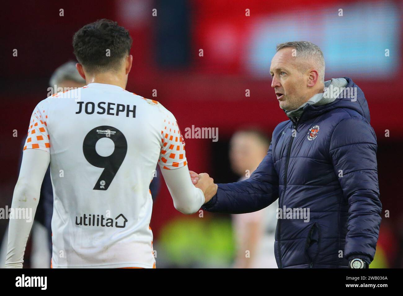 Nottingham, UK. 07th Jan, 2024. Kyle Joseph of Blackpool and Neil ...