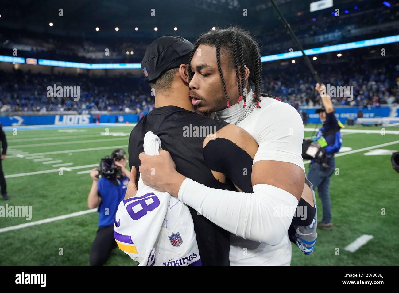 Detroit Lions wide receiver Amon-Ra St. Brown, left, and Minnesota ...