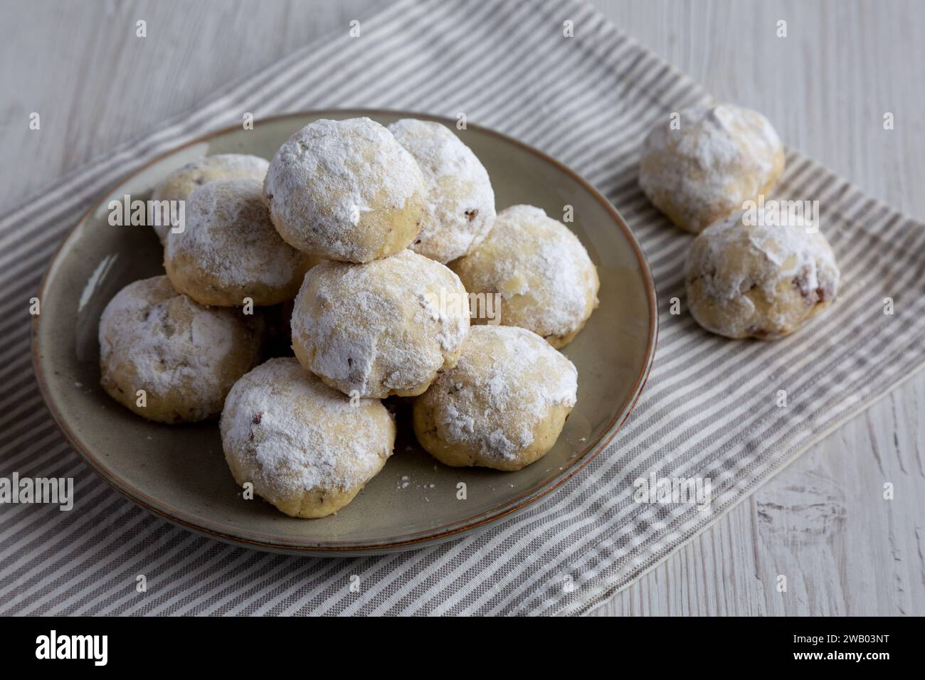 Homemade Snowball Cookies on a Plate, side view Stock Photo - Alamy
