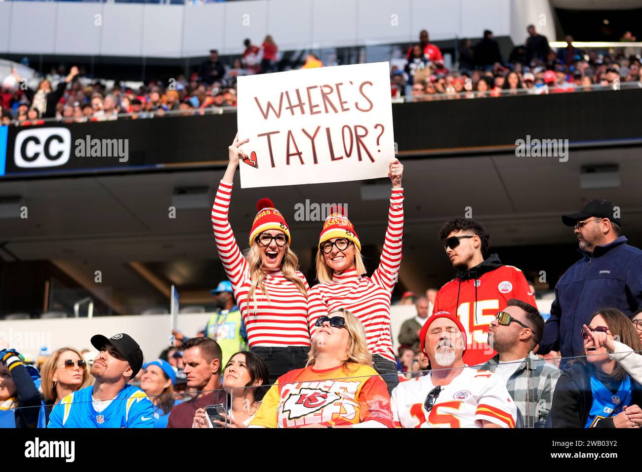 Kansas City Chiefs fans hold a sign for singer Taylor Swift during the ...