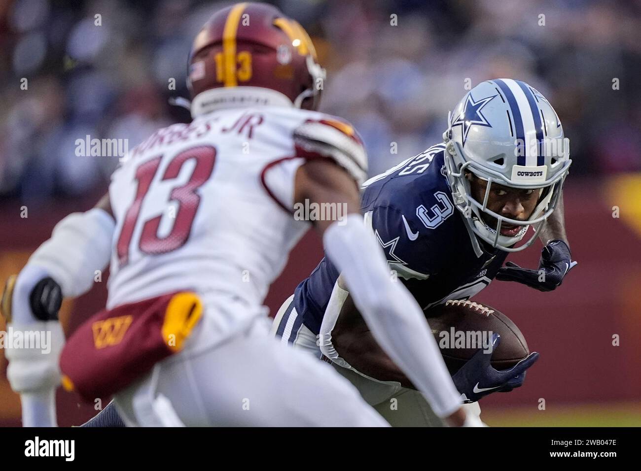 Dallas Cowboys wide receiver Brandin Cooks (3) carries the ball while ...