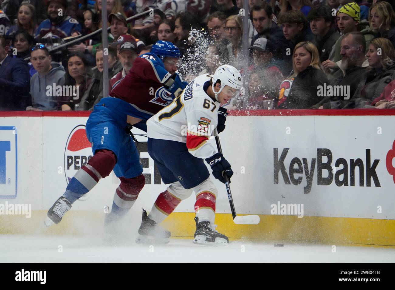 Colorado Avalanche defenseman Kurtis MacDermid (56) checks Florida ...
