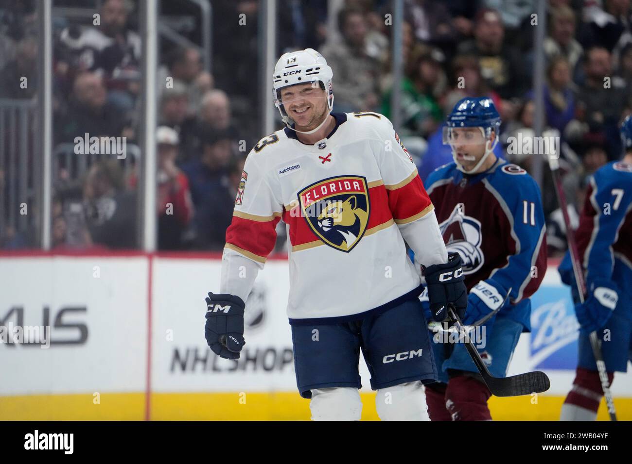 Florida Panthers center Sam Reinhart (13) smiles after notching a hat ...