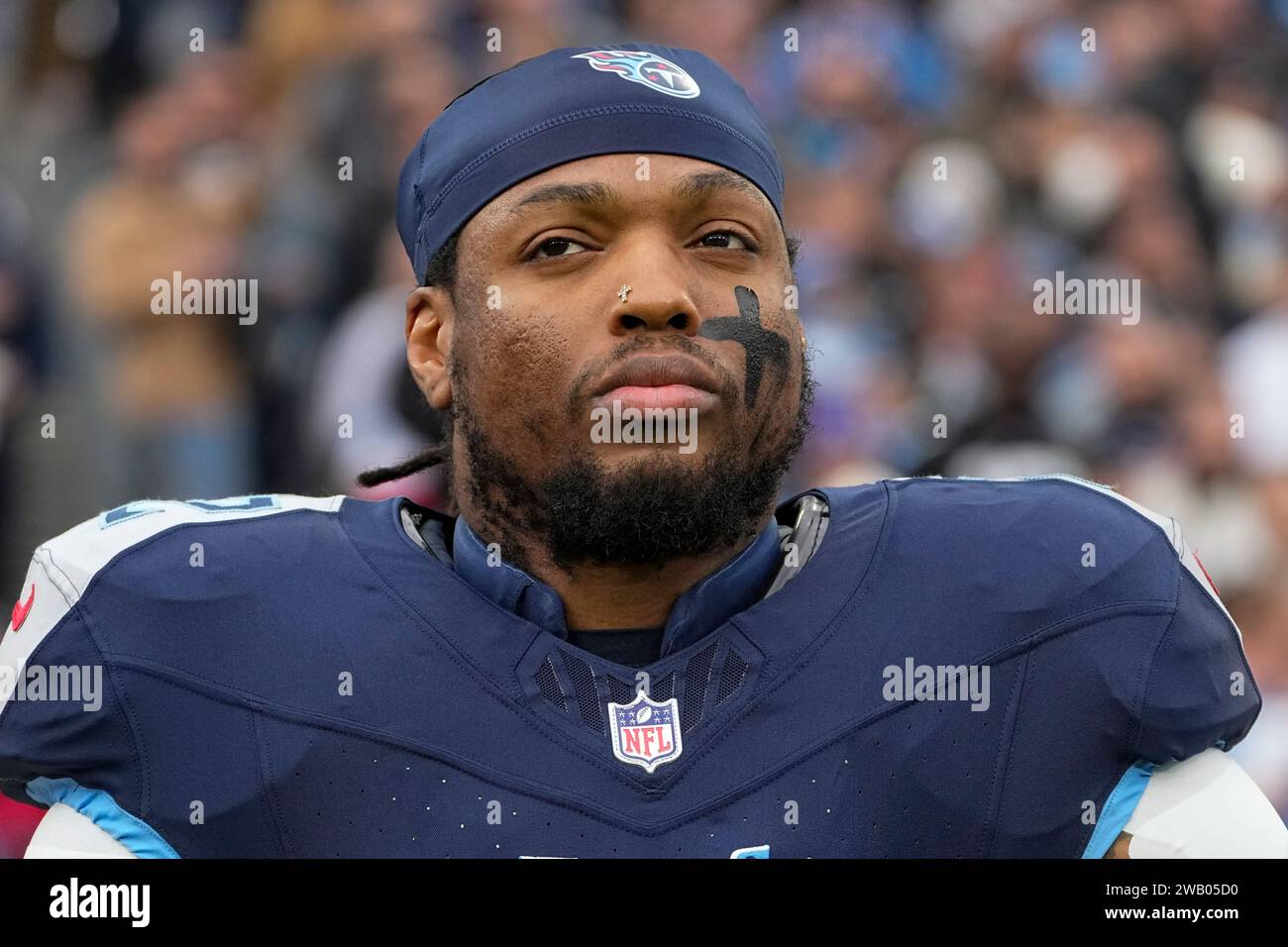 Tennessee Titans running back Derrick Henry stands on the sideline ...