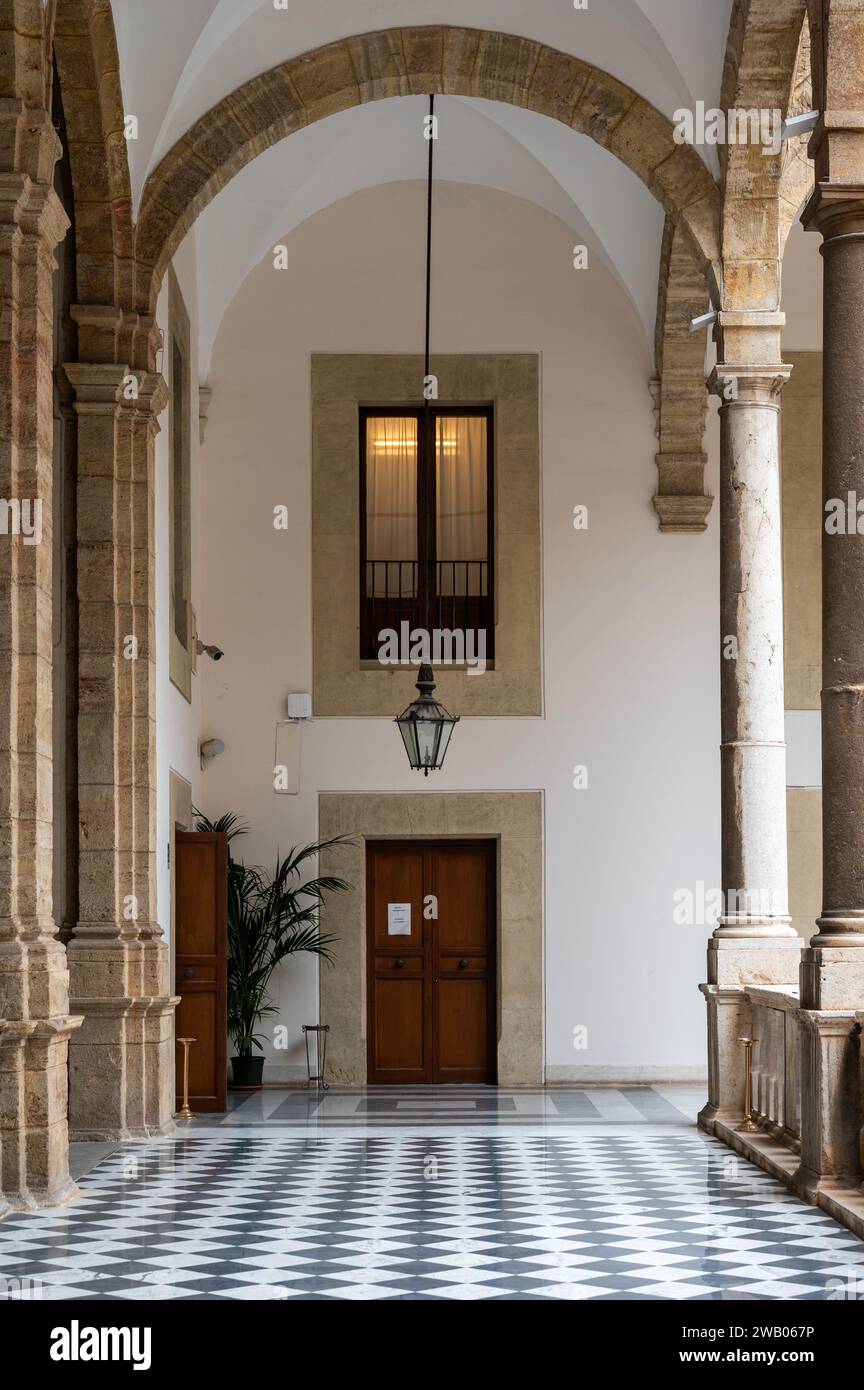 Palermo, Sicily, Italy, December 14, 2023 - Arched corridor with ...