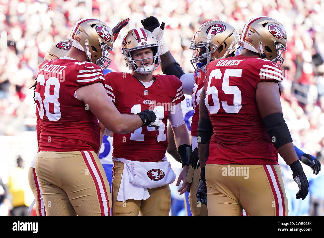 San Francisco 49ers quarterback Sam Darnold (14) is congratulated by ...