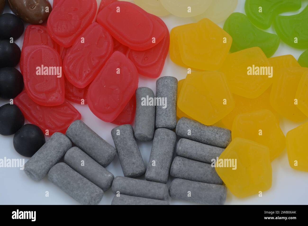 An assortment of unusual branded factory gummy candies in the form of ...
