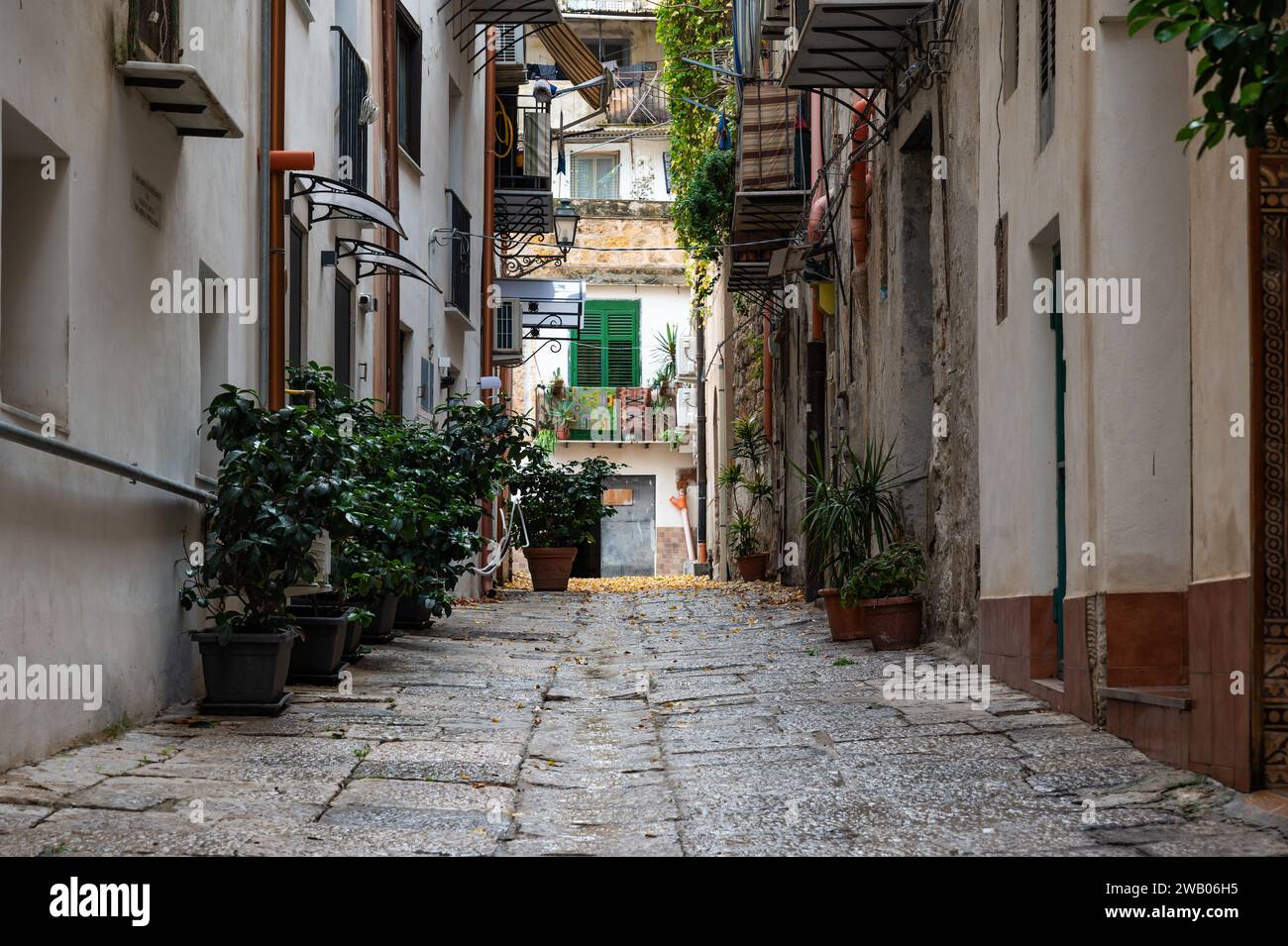 Palermo, Sicily, Italy, 15 December 2023 - Low angle view over narrow ...