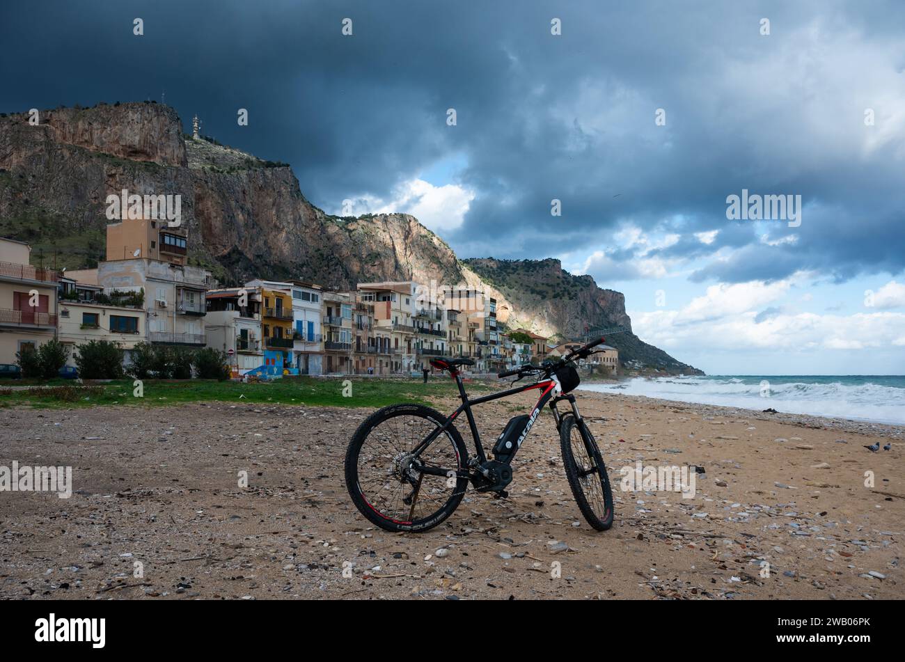 Aranella, Sicily, Italy, December 16, 2023 - Mountain bike at the sandy ...