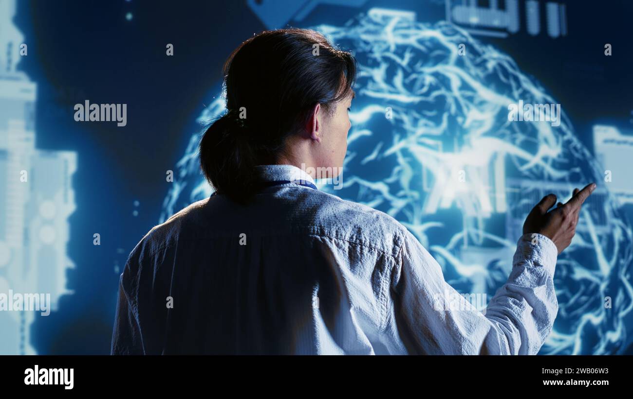 Overseeing manager developing artificial intelligence neural networks architecture inspired by ...