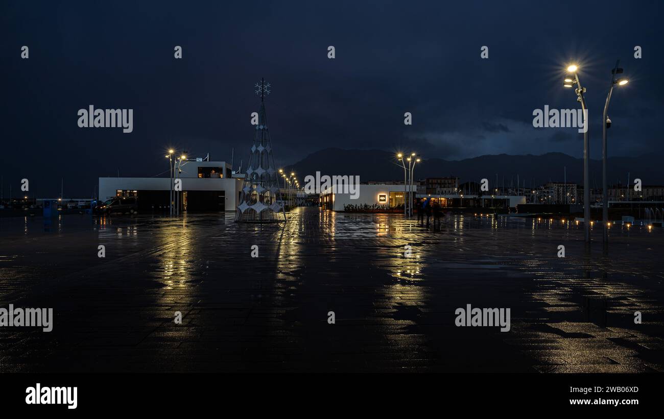 Palmero, Sicily, Italy, December 16, 2023 - The wet and reflecting ...