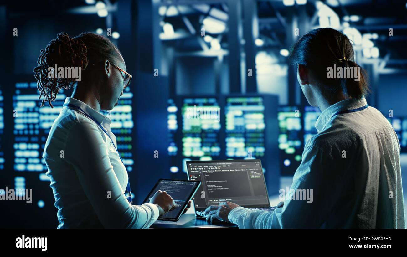 Coworkers Programming In Server Hub Housing Advanced Infrastructure Storing Massive Datasets