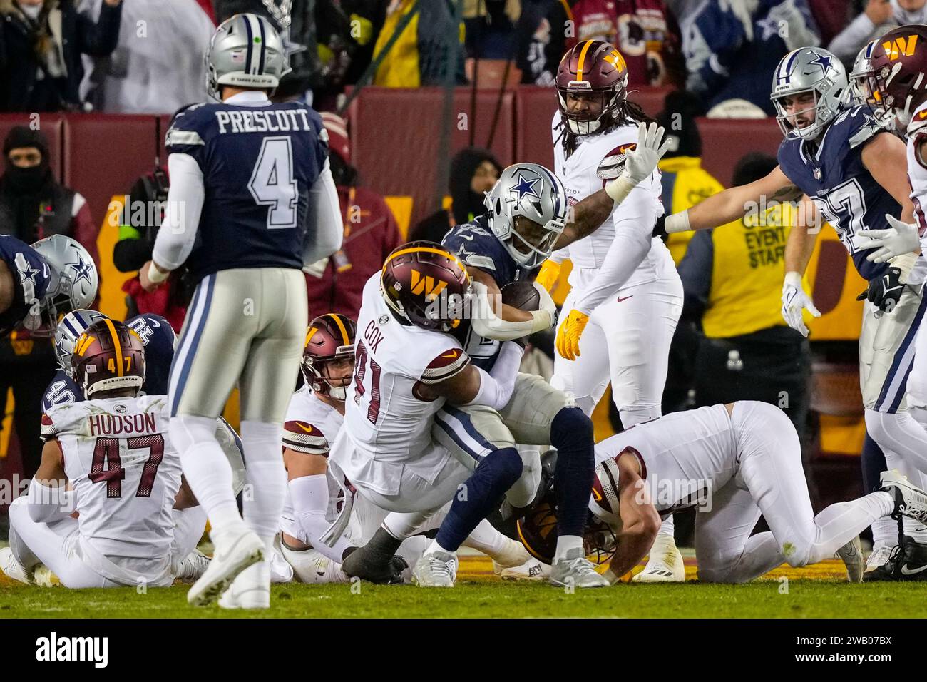 Dallas Cowboys running back Tony Pollard (20) raises his arm while ...