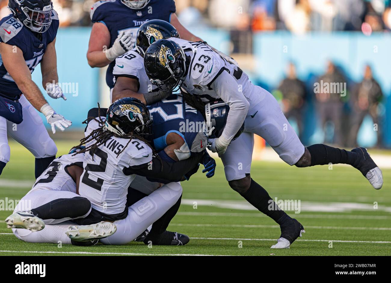 Tennessee Titans running back Derrick Henry (22) is tackled by ...