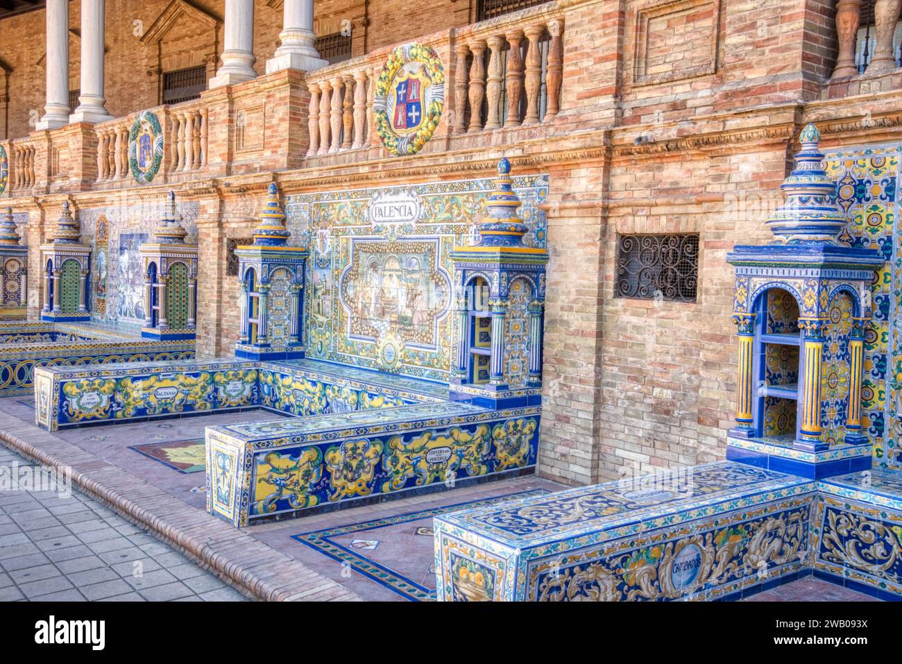 Beautiful ceramic ornate benches in the Plaza de Espana in Seville ...