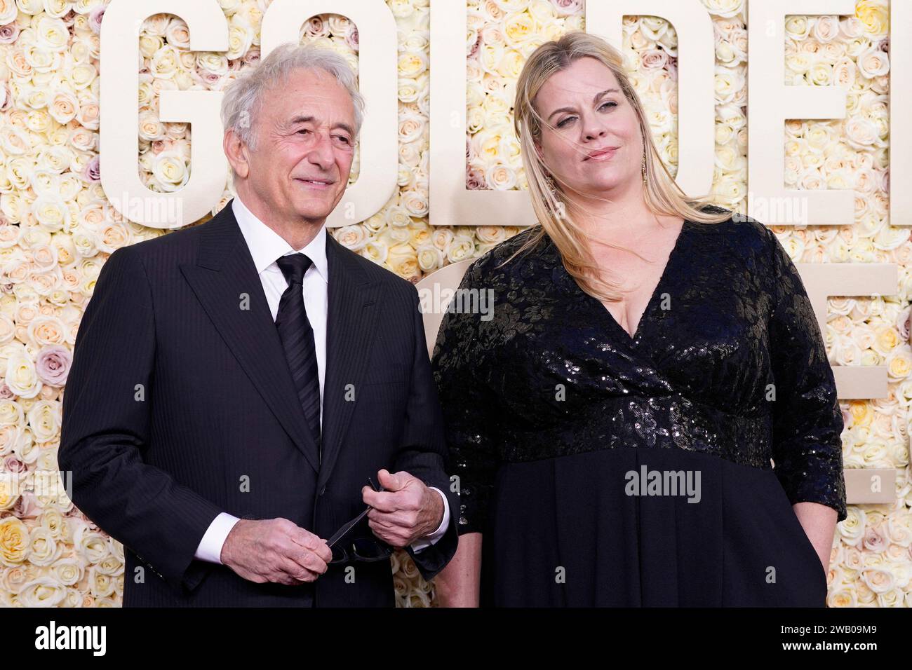 Fred Berner, left, and Amy Durning arrive at the 81st Golden Globe ...