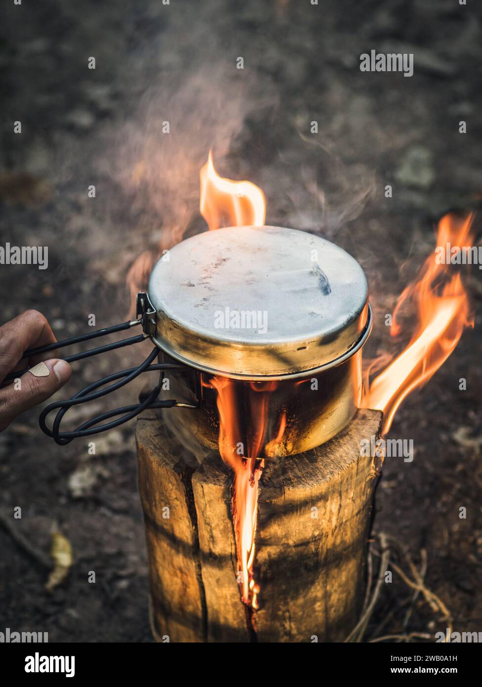 Boiling water in camping pot hi-res stock photography and images - Alamy
