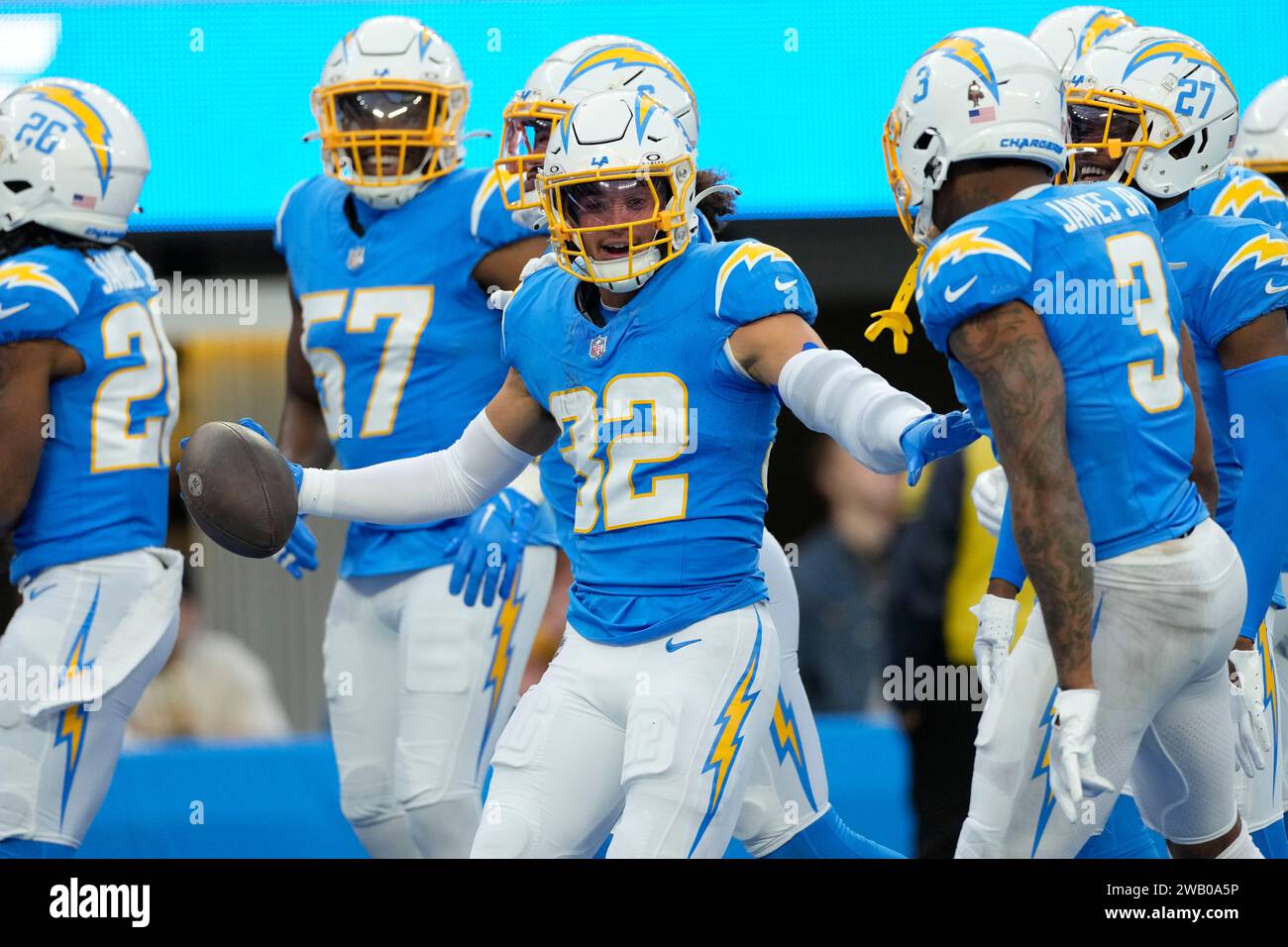 Los Angeles Chargers safety Alohi Gilman, center, celebrates with ...