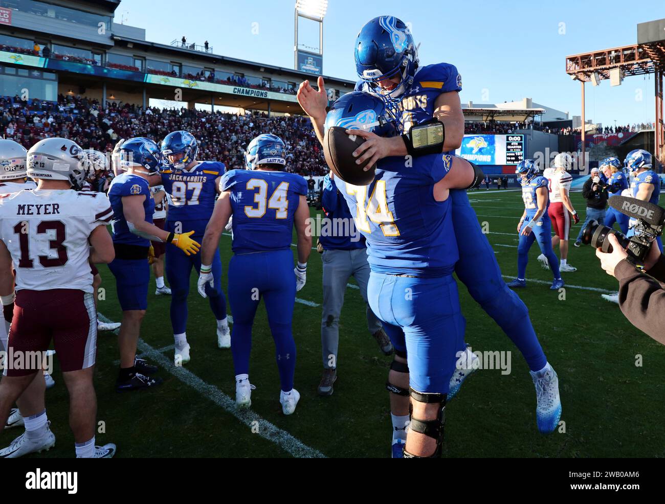 South Dakota State offensive lineman Garret Greenfield (74) lifts ...