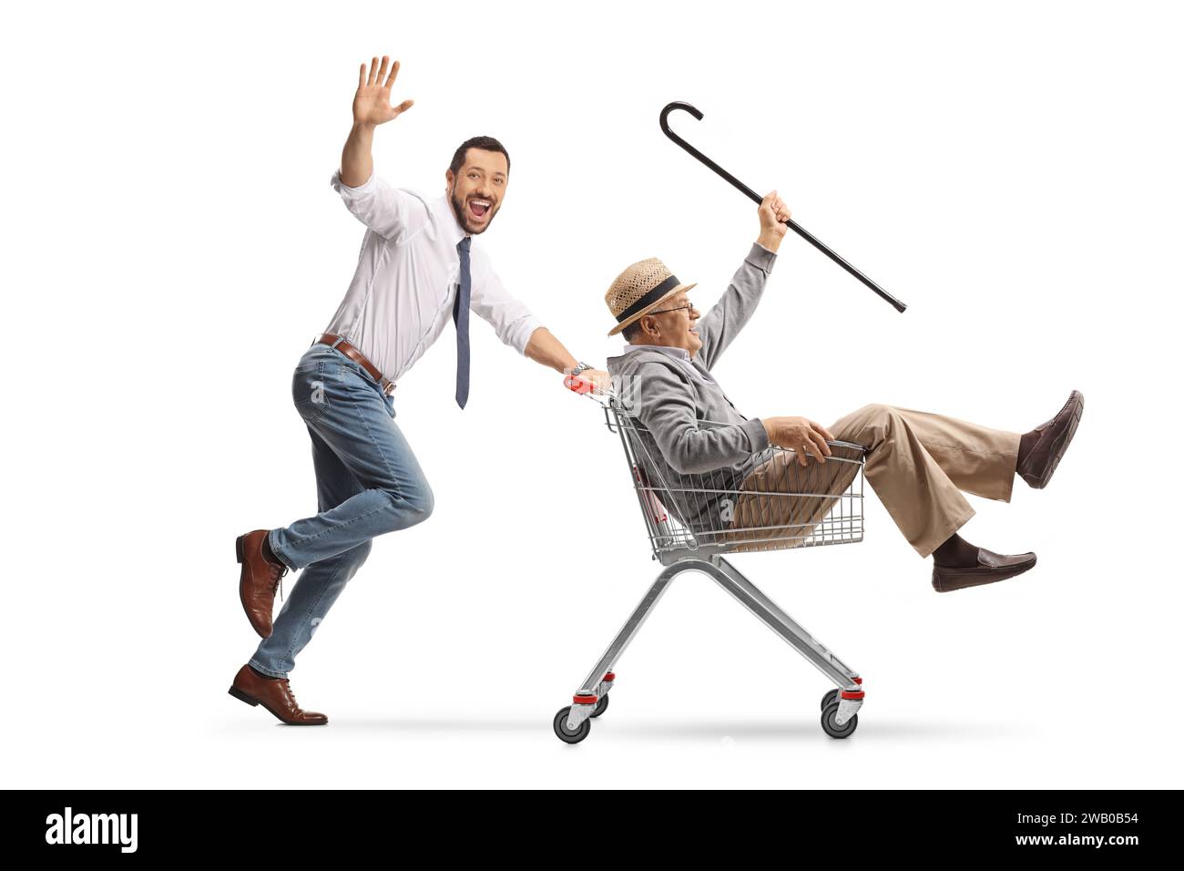 Cheerful young businessman running and pushing a senior man in a ...