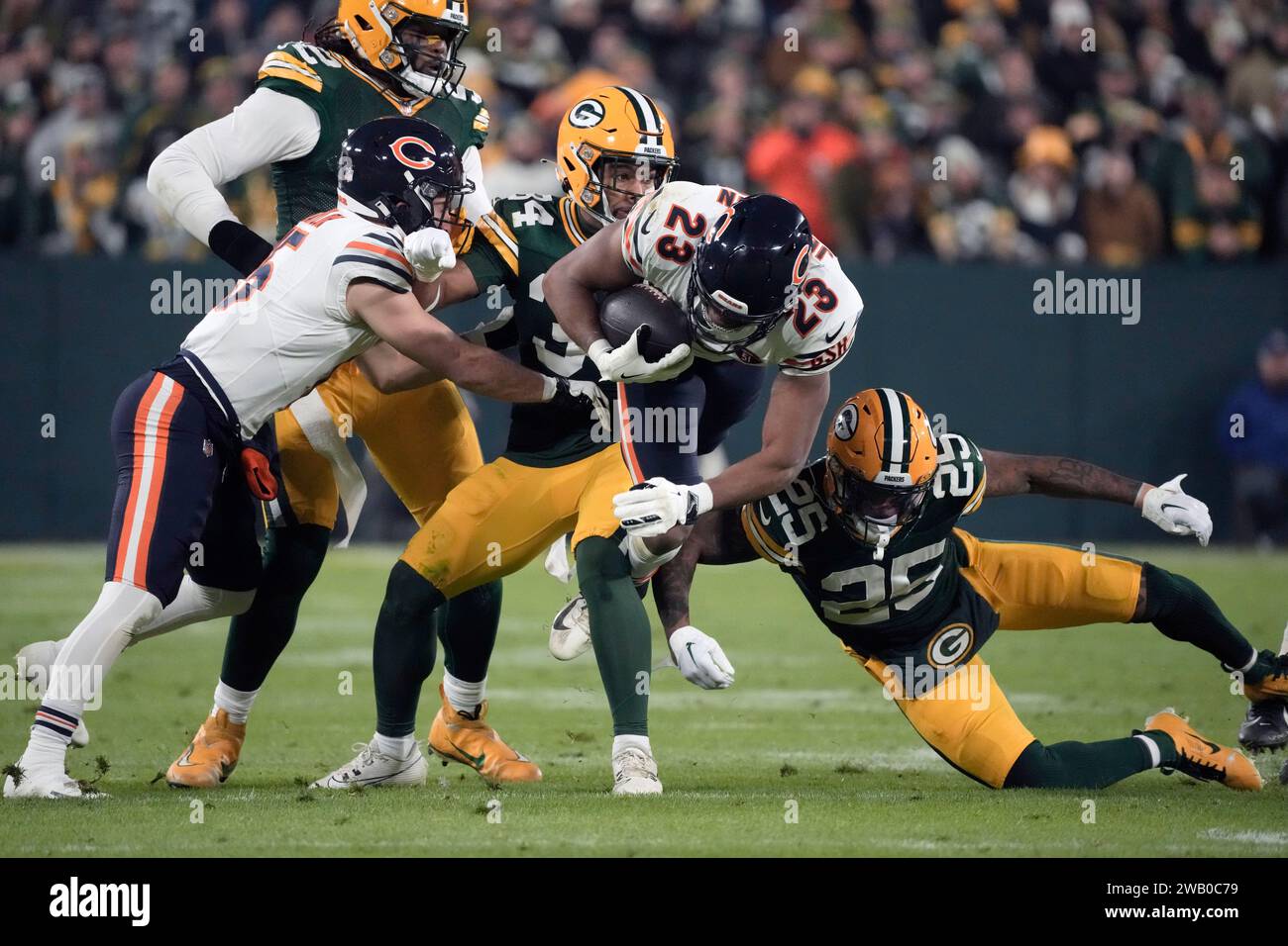 Chicago Bears running back Roschon Johnson (23) runs with the ball as ...