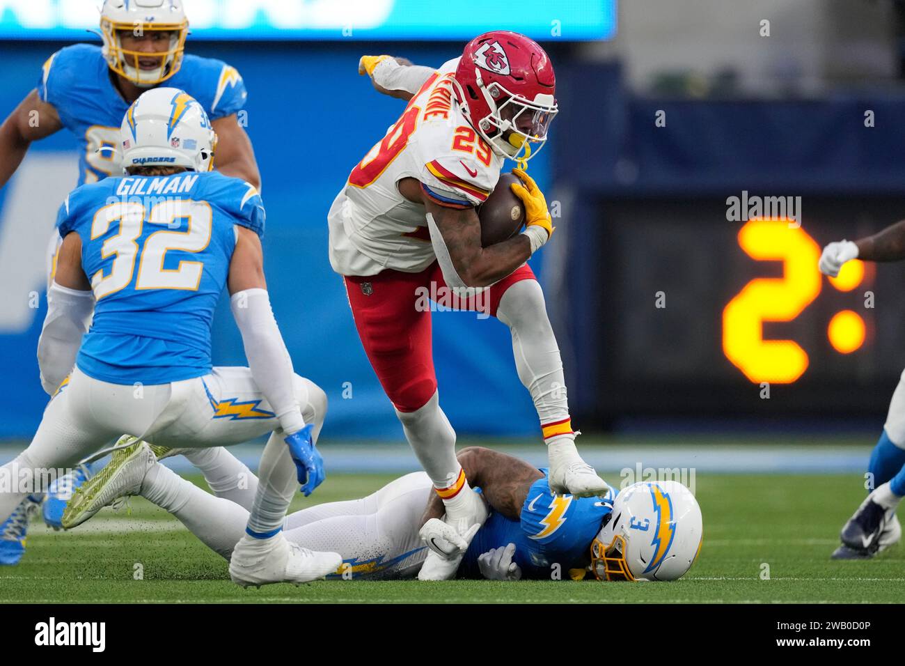 Kansas City Chiefs running back La'Mical Perine, above, gets away from ...