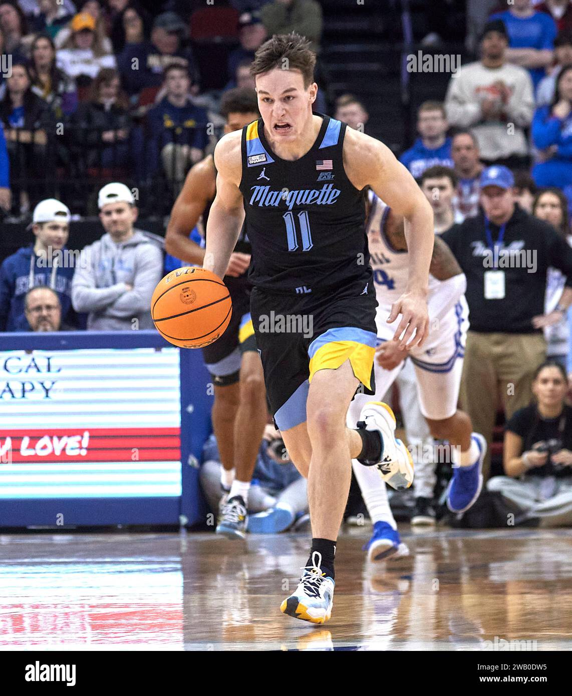 Marquette Golden Eagles guard Tyler Kolek (11) pushes the ball up court ...