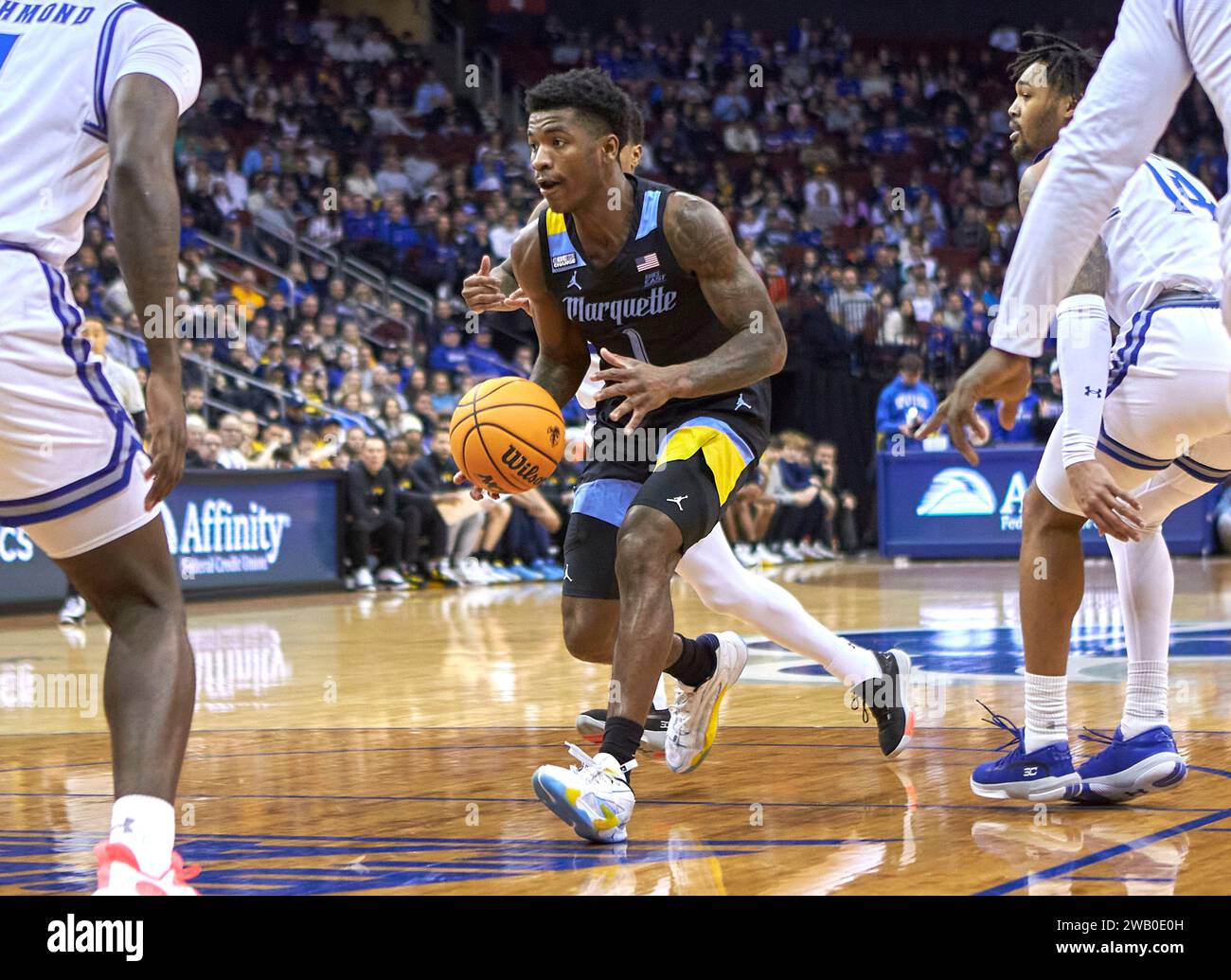 Marquette Golden Eagles guard Kam Jones (1) penetrates toward the ...