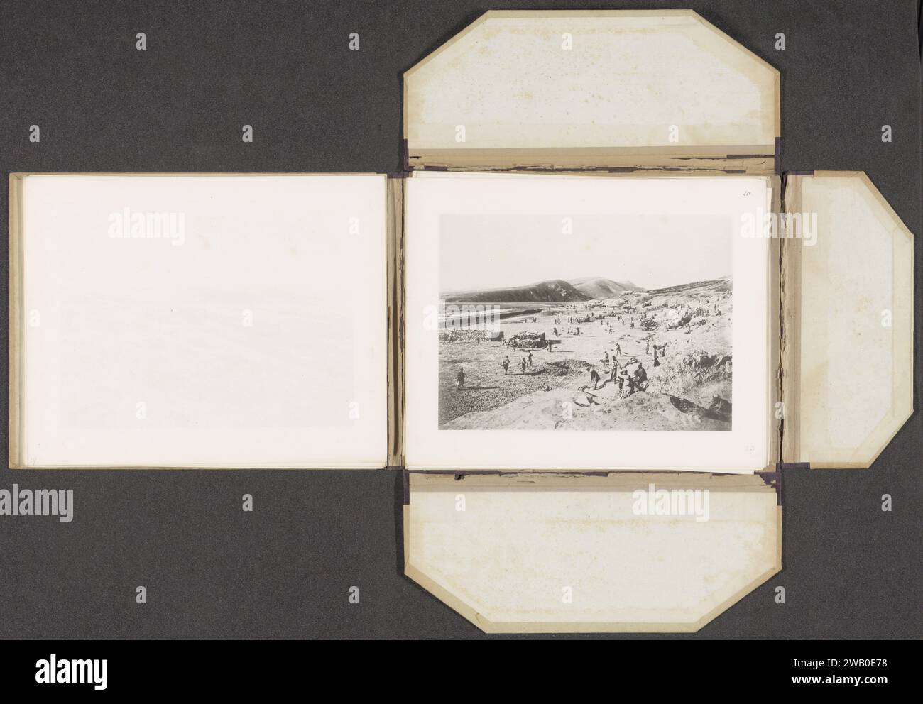 Workers prepare the construction of a railway line in Port Arthur, 1898 ...