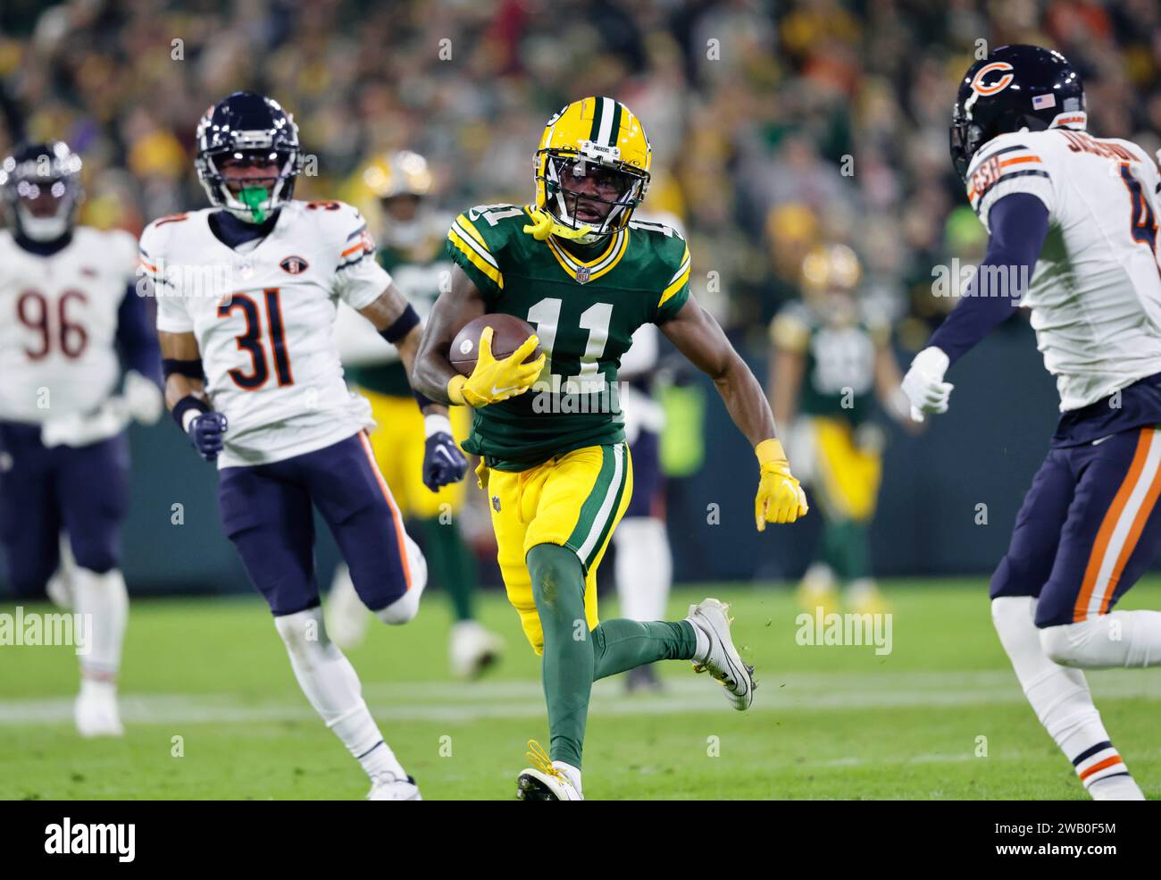 Green Bay Packers wide receiver Jayden Reed (11) runs for a first down ...