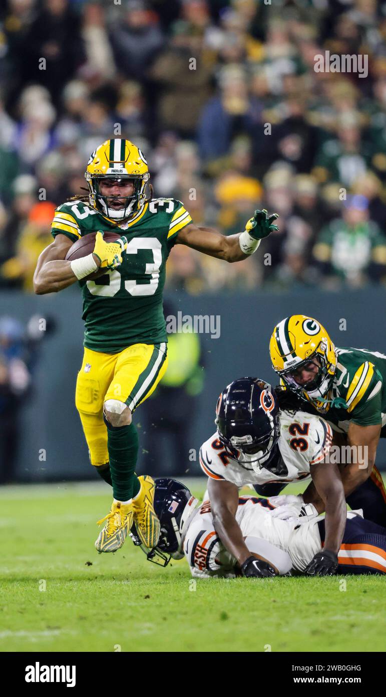 Green Bay Packers running back Aaron Jones (33) runs during an NFL football game against the ...