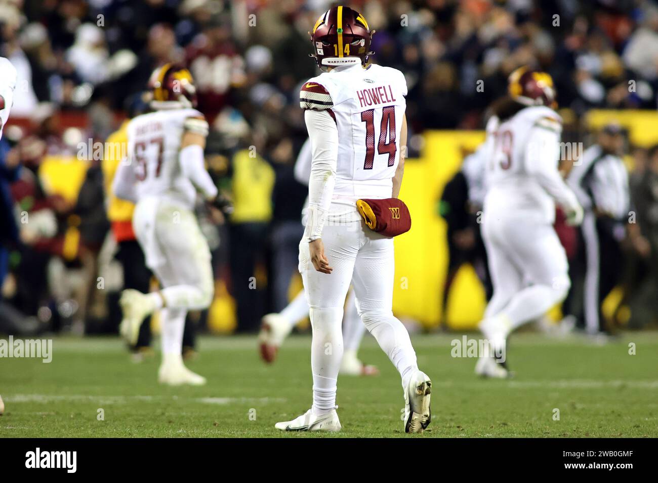 Washington Commanders quarterback Sam Howell (14) walks off the field during an NFL football ...