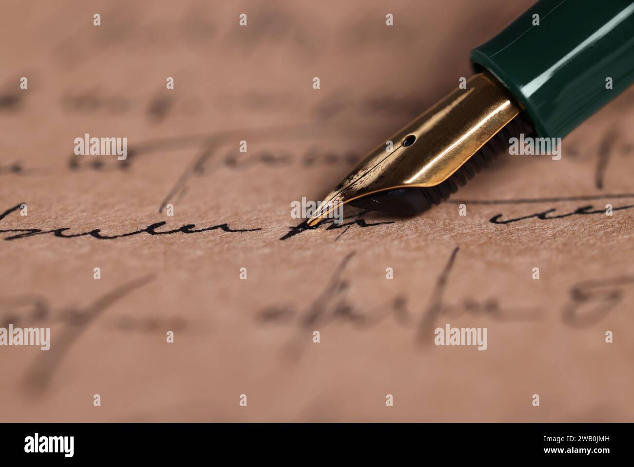 Writing letter with elegant fountain pen, closeup Stock Photo - Alamy