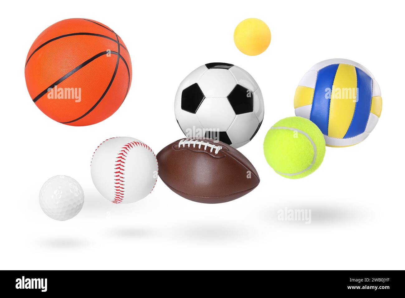 Many balls for different sports flying on white background Stock Photo ...