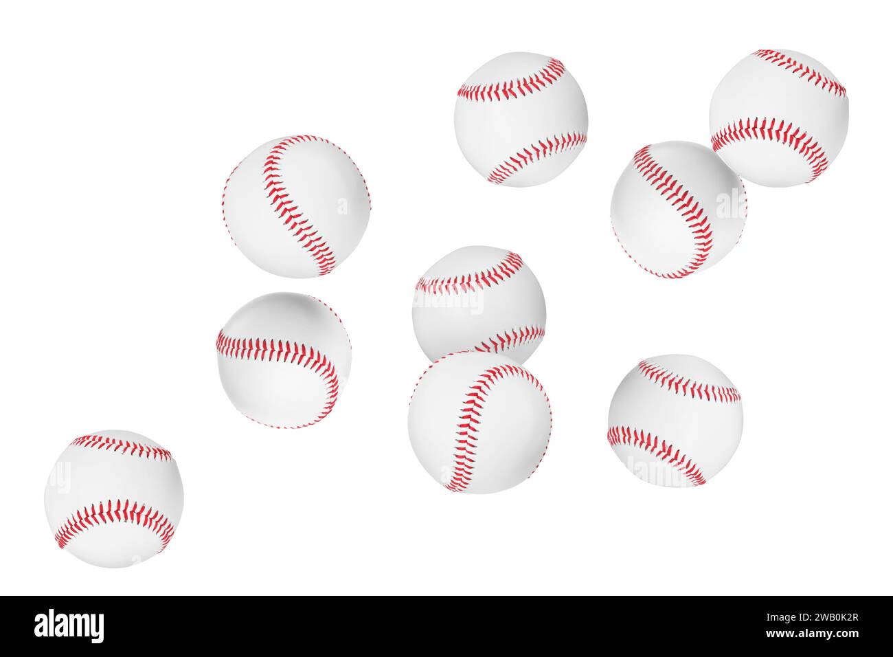 Many baseball balls flying on white background Stock Photo - Alamy