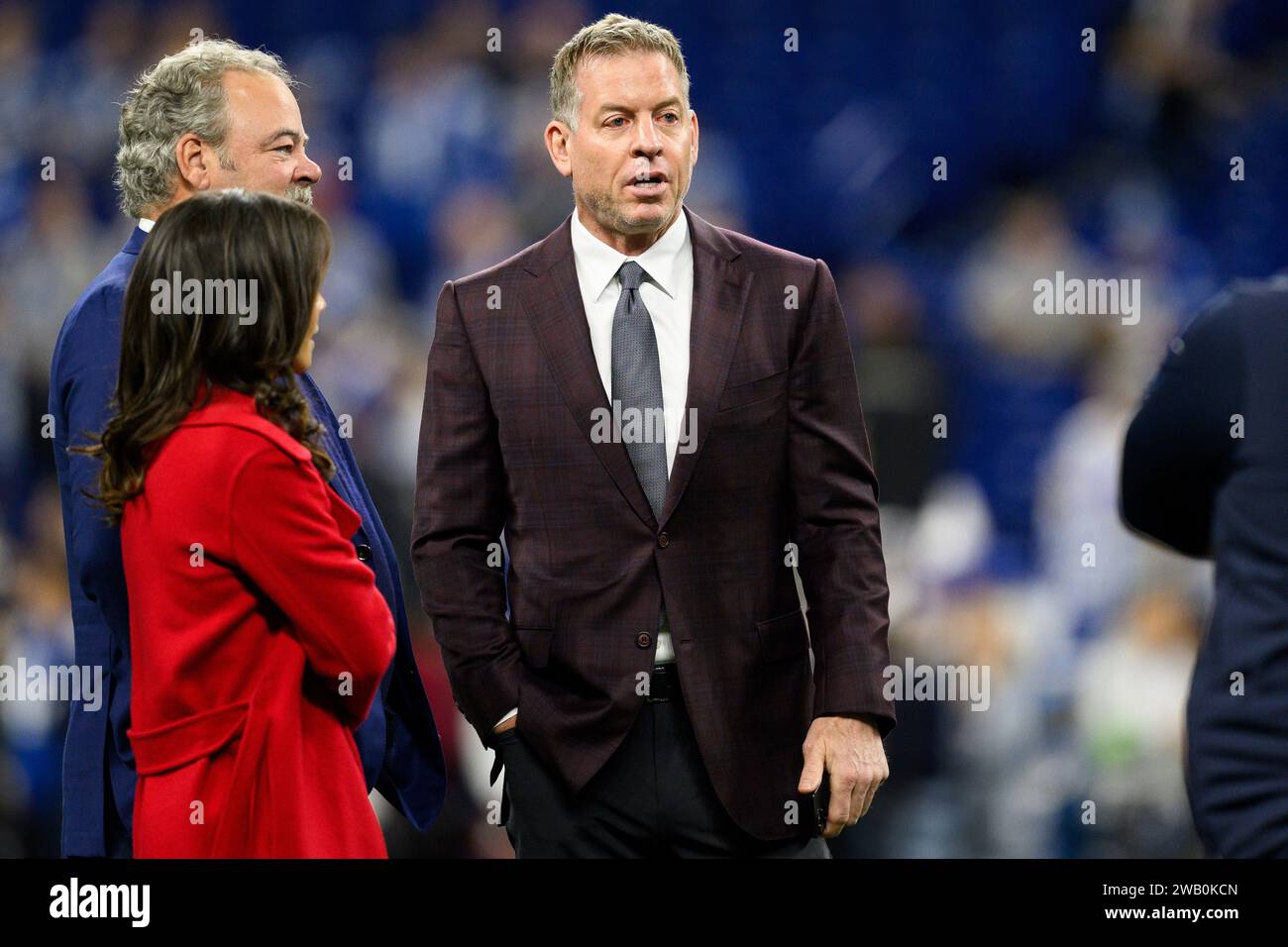 ESPN broadcaster Troy Aikman on the field before an NFL football game ...