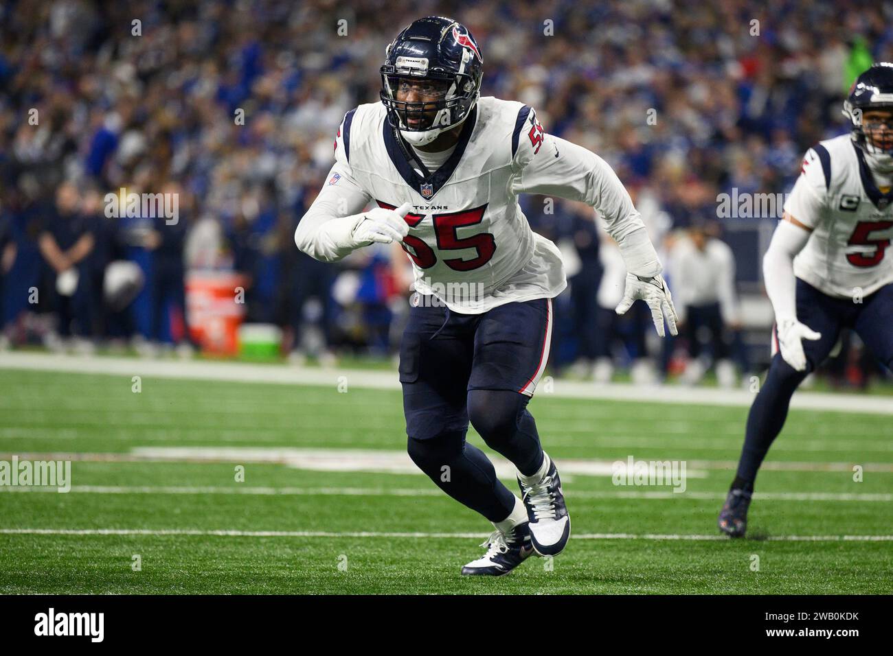 Houston Texans defensive end Jerry Hughes (55) rushes around the edge ...