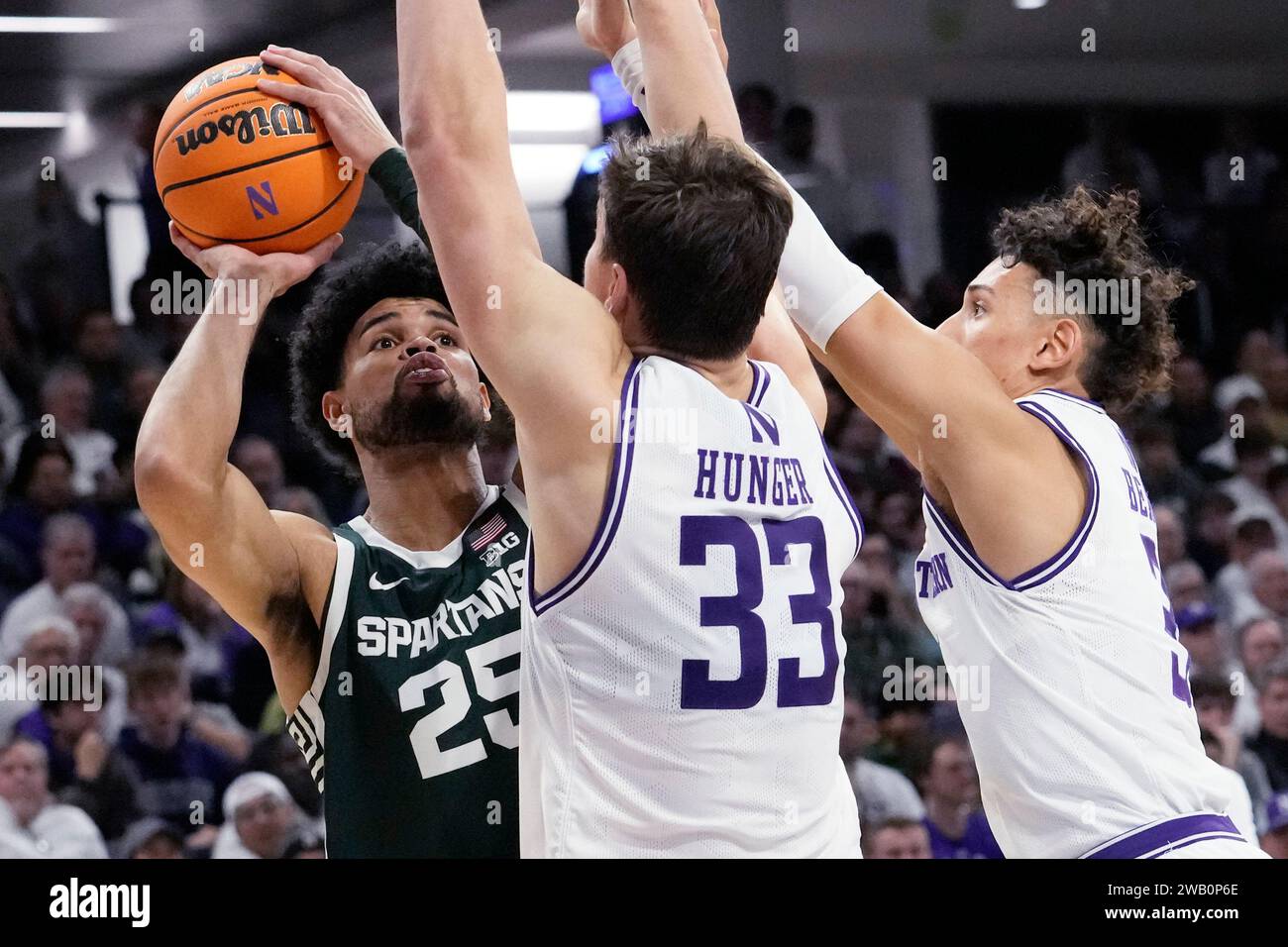 Michigan State forward Malik Hall, left, looks to the basket as ...