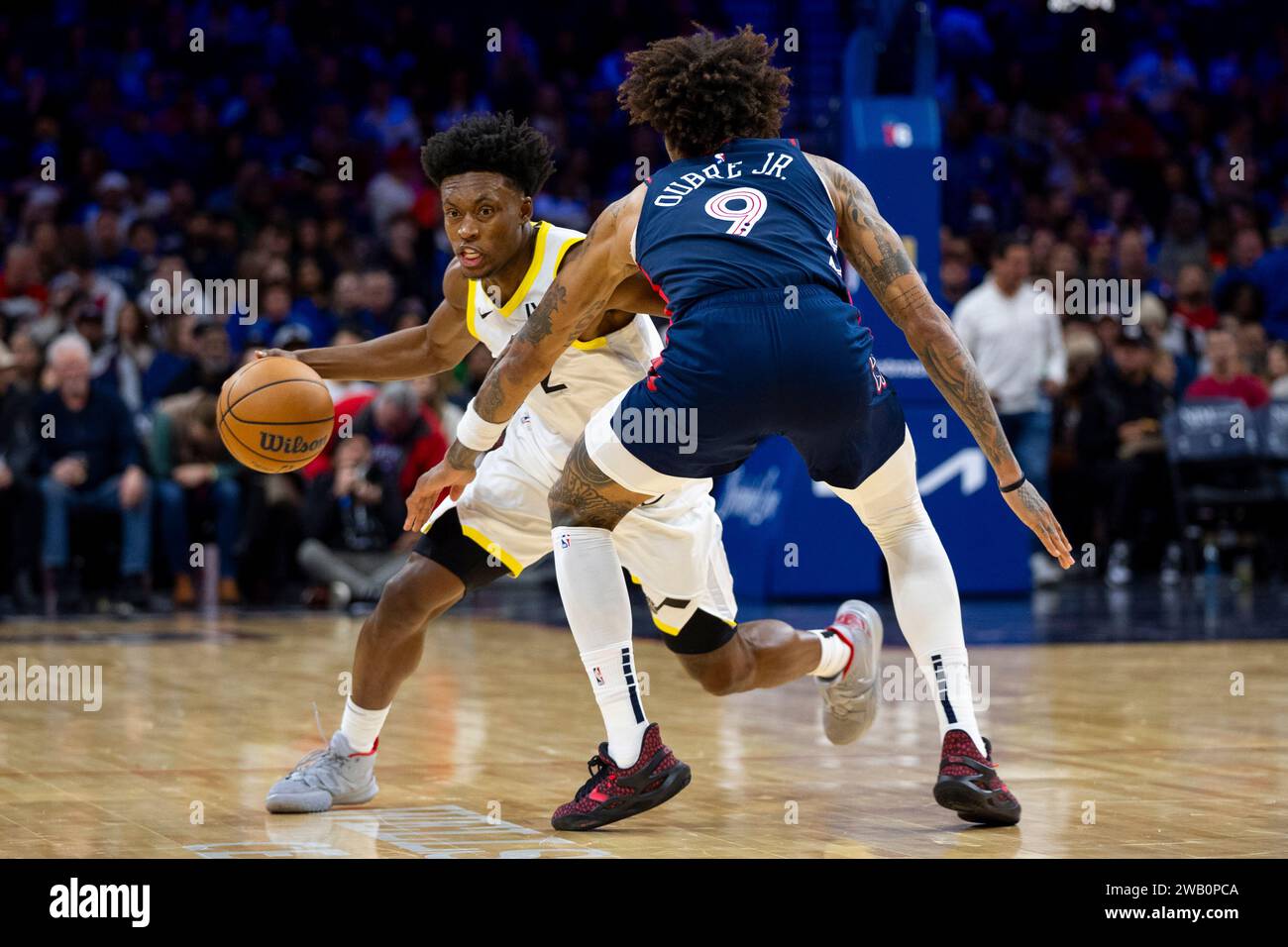 Utah Jazz's Collin Sexton, left, in action against Philadelphia 76ers ...