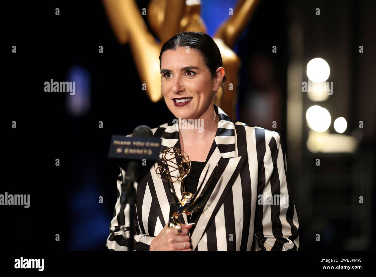 EXCLUSIVE - Alex Bach poses with the award for outstanding short form ...