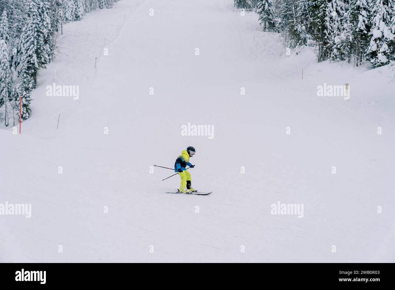Yellow ski suit hi-res stock photography and images - Alamy