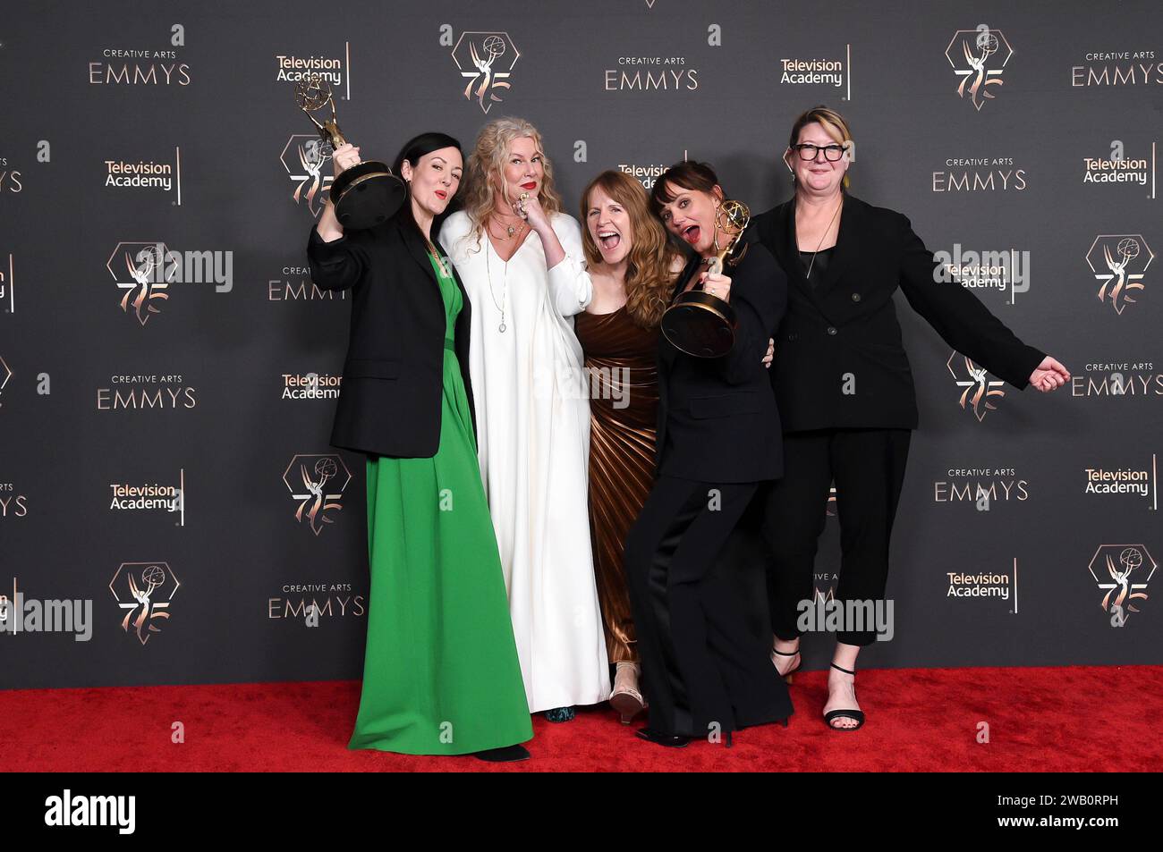 The team from "Apple - The Greatest - Accessibility" pose in the press ...